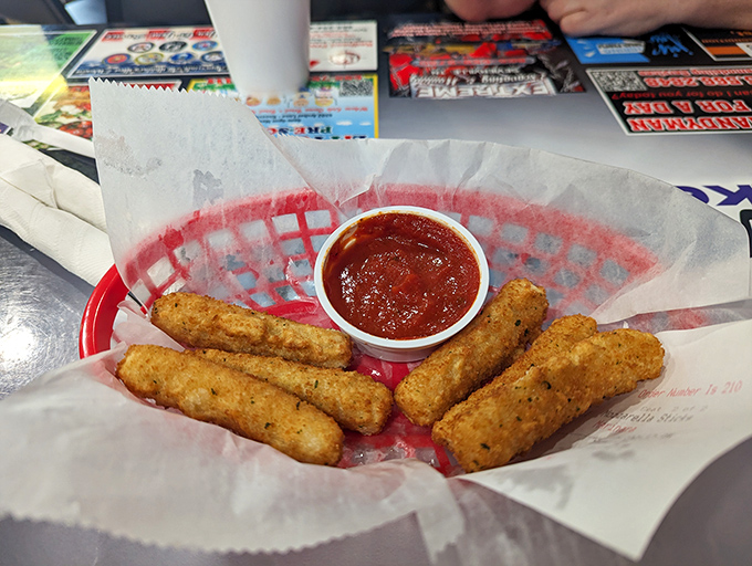 Mozzarella sticks with that perfect pull-apart cheese stretch. The marinara sauce is just waiting to play its supporting role in this dairy drama.