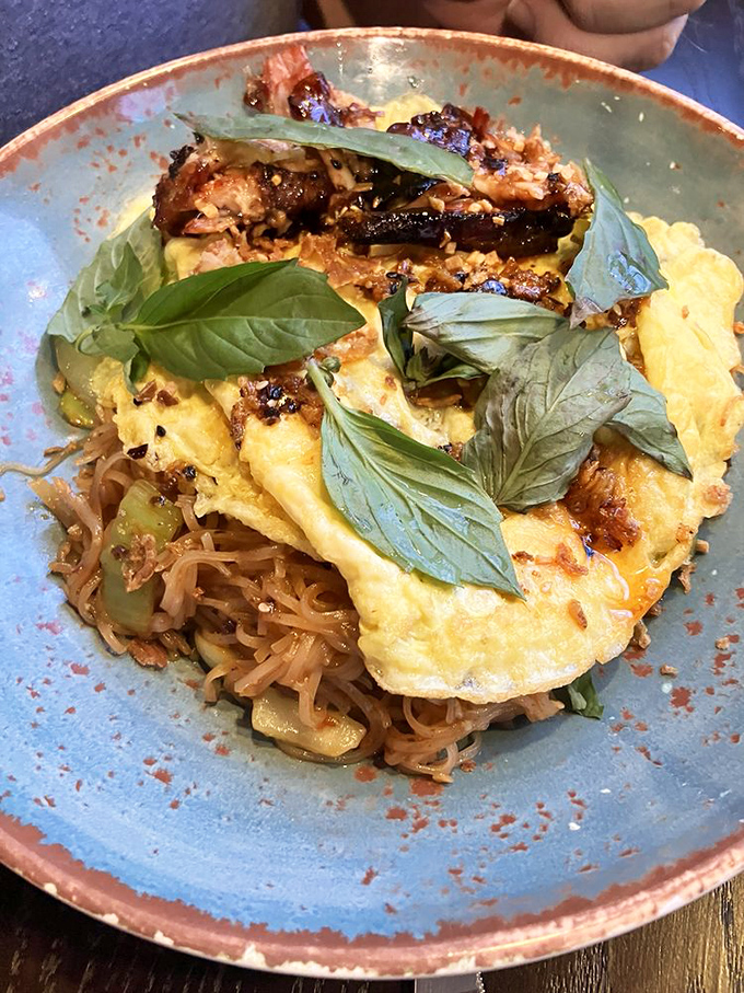 Not Pad Thai indeed&mdash;this noodle dish with its fresh basil crown refuses to be ordinary, and your taste buds are better for it.