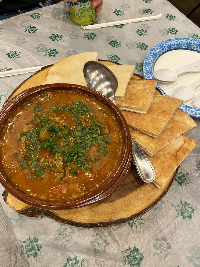 This isn't just stew &ndash; it's a warm hug in a clay pot, with tender okra swimming in a rich, herb-flecked broth that demands to be sopped up with bread.