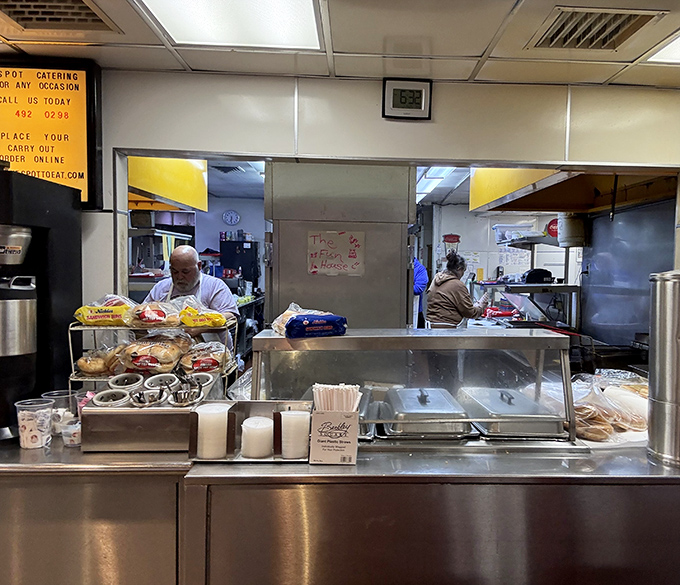 The open kitchen isn't about trendy transparency&mdash;it's about the reassuring sight of real people making real food the same way for generations.