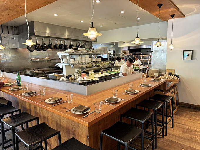 The open kitchen invites you to watch pizza artistry in action. It's dinner and a show, minus the ticket price.