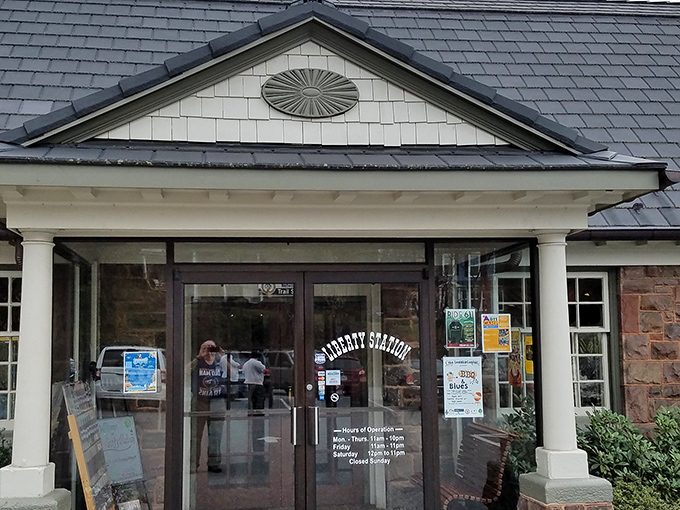 The entrance reveals operating hours that feel like an invitation to your next memorable meal in Bedford.