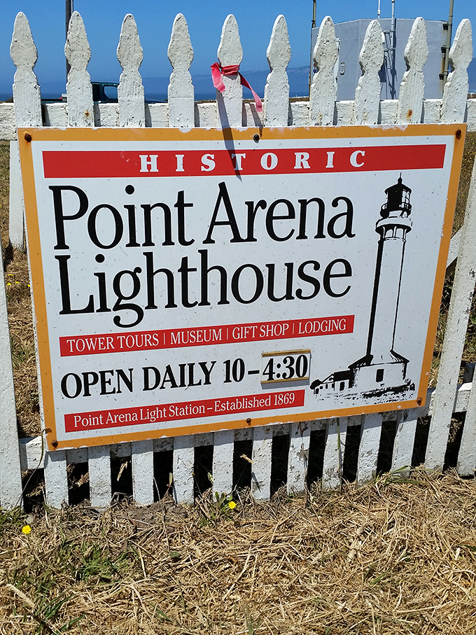 The white picket fence and vintage sign announce your arrival at a slice of California maritime history. Operating hours included &ndash; no excuses for missing it. 