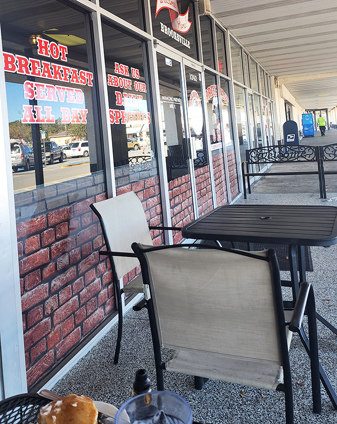 Outdoor seating where Florida sunshine meets morning coffee&mdash;nature's own breakfast blessing.