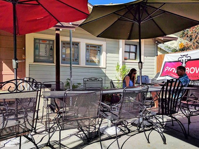 The outdoor patio offers a perfect Florida setting for savoring your sandwich masterpiece. Even the wrought iron chairs seem to whisper, "Stay awhile."