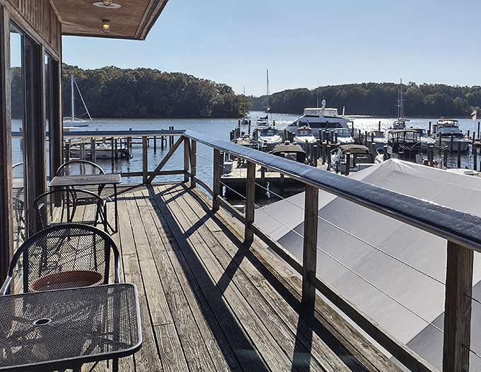 The outdoor deck offers front-row seats to nature's show on the Sassafras River. Worth the wait on sunny days when boats drift by like clouds.