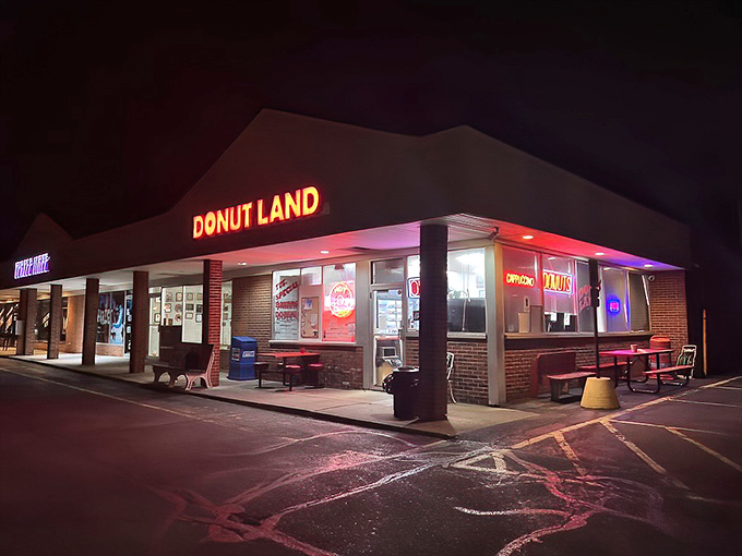 Evening glow transforms this humble donut shop into a beacon for anyone craving authentic sweetness.