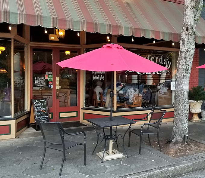 Outdoor seating under pink umbrellas&mdash;because buttermilk pie tastes even better with a side of fresh Georgia air and people-watching.