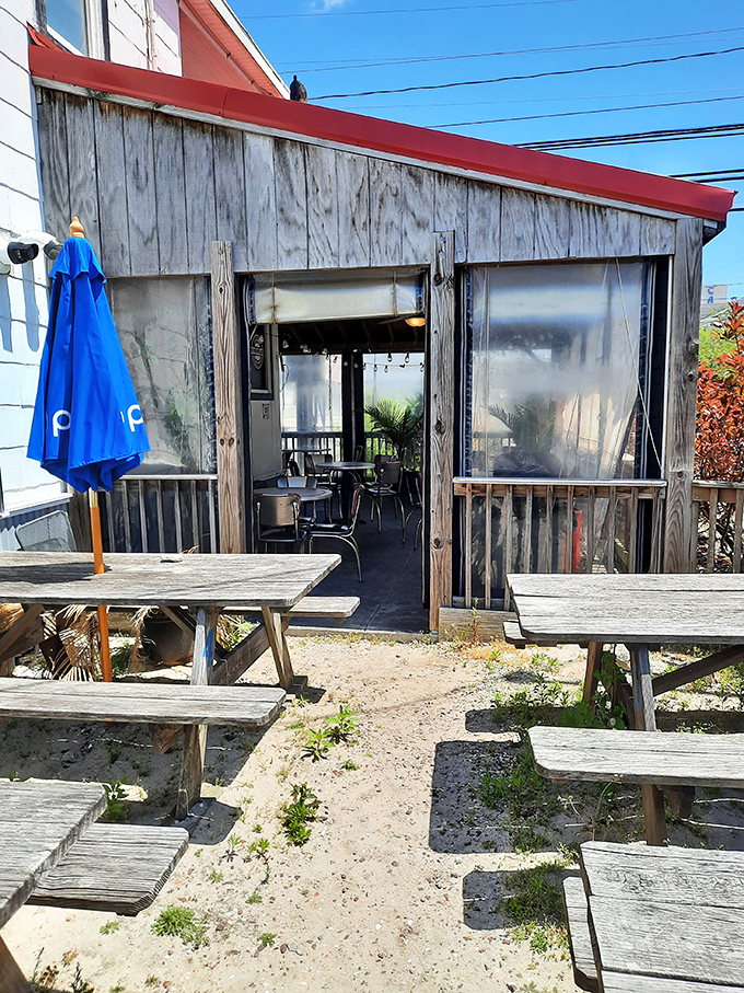 Outdoor seating for those who prefer their pastrami with a side of vitamin D. Beach casual meets deli serious.