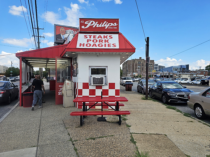 The outdoor seating area offers just enough space to enjoy your sandwich fresh from the window. No frills, just fulfillment.