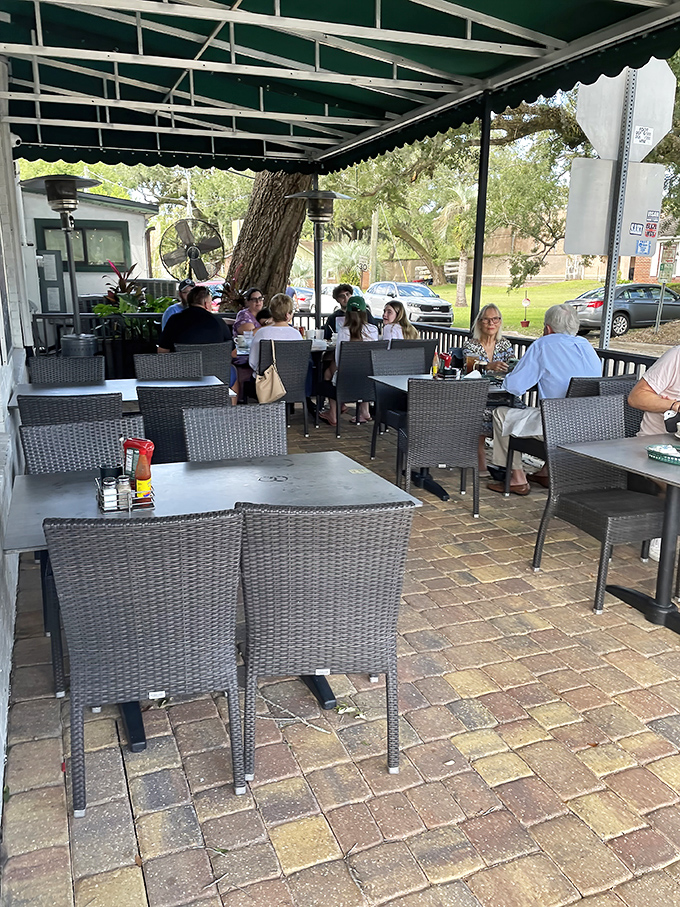 Florida dining done right&mdash;outdoor seating under green awnings where gentle breezes complement your coffee and conversation flows as easily as the refills.