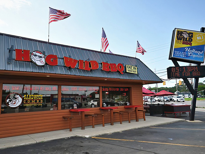 The roadside view of Hog Wild promises no-nonsense barbecue satisfaction. Those wooden benches outside aren't fancy, but they've supported countless happy diners.