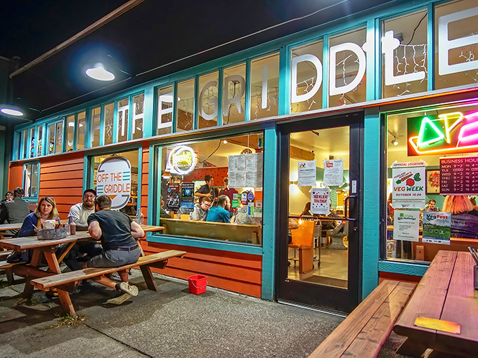 As evening falls, Off The Griddle glows like a beacon for hungry travelers. Those outdoor tables have witnessed countless first dates and food epiphanies.