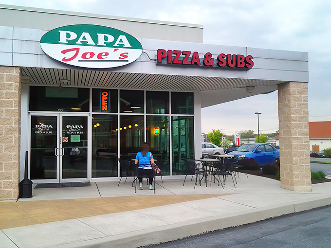 The iconic green and red sign serves as a beacon for the pizza-deprived. That outdoor seating calls your name on pleasant days.