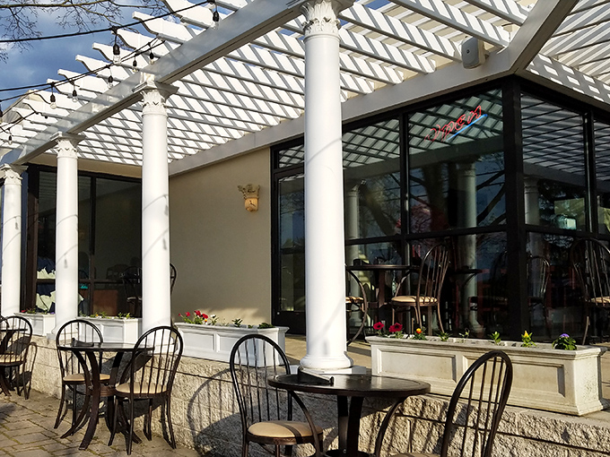 White columns and pergolas create a courtyard feeling that's straight out of a Greek island. Pennsylvania sunshine has never felt so Mediterranean.