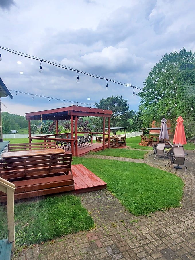 The outdoor patio where Michigan's natural beauty provides the perfect backdrop for post-dinner conversations and digestive contemplation.