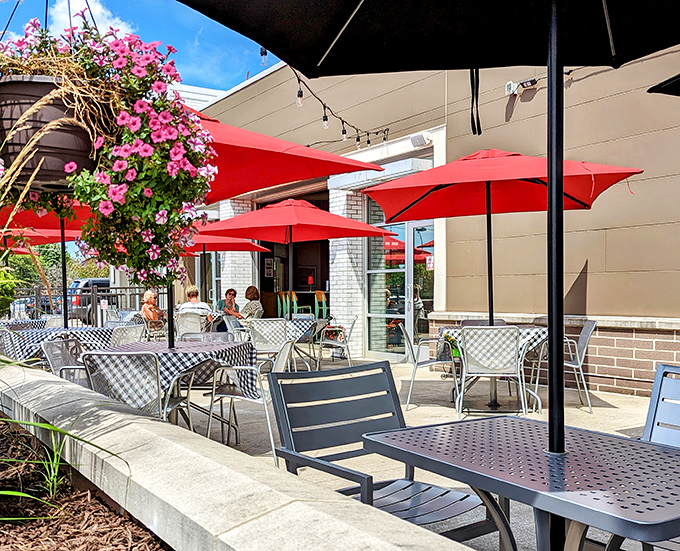 Ohio summers were made for this patio&mdash;red umbrellas, checkered tablecloths, and flowering plants creating an urban oasis for al fresco dining.
