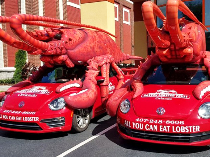Even the cars get dressed for dinner at Boston Lobster Feast, sporting lobster toppers that would make any convertible jealous.