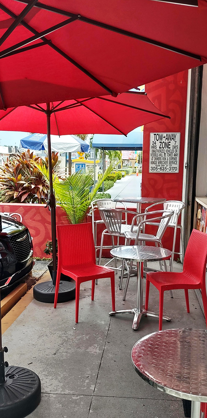 The sidewalk seating under Miami's blue skies offers the perfect stage for your first bite of frita magic.
