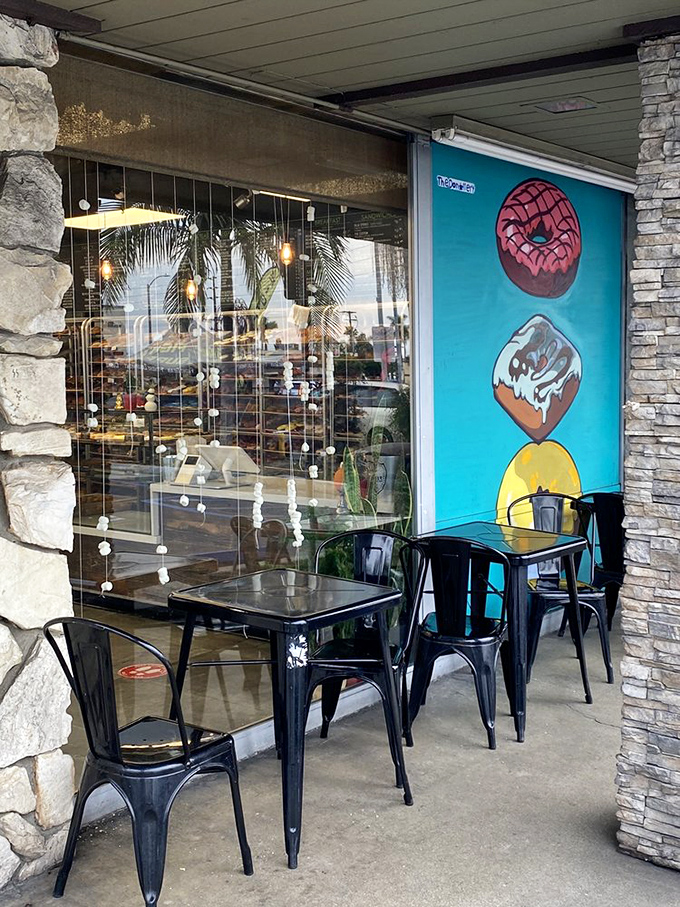 Outdoor seating where donut enthusiasts can enjoy their treasures while watching the world go by, one sugar rush at a time.