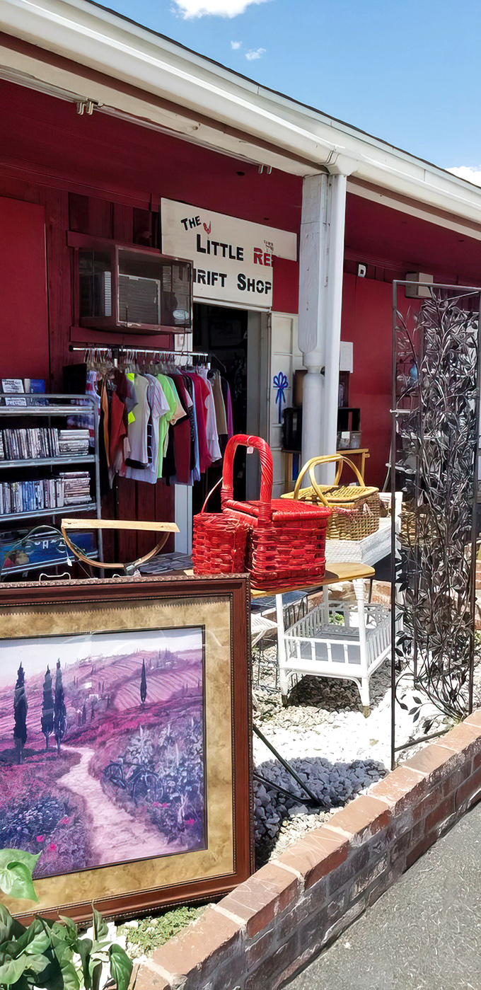 Sidewalk treasures beckon passersby with colorful baskets and framed landscapes. The shop's overflow creates an impromptu art gallery under the California sun.
