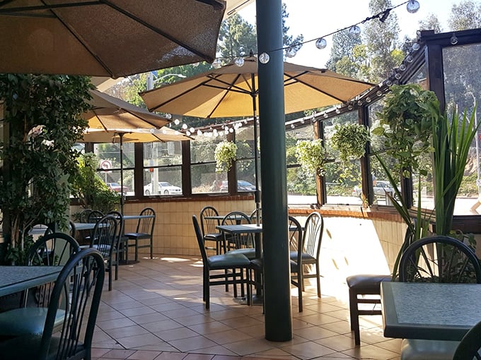 The secret patio &ndash; where umbrella-dappled sunshine turns ordinary breakfast into a mini-vacation without the TSA pat-down.