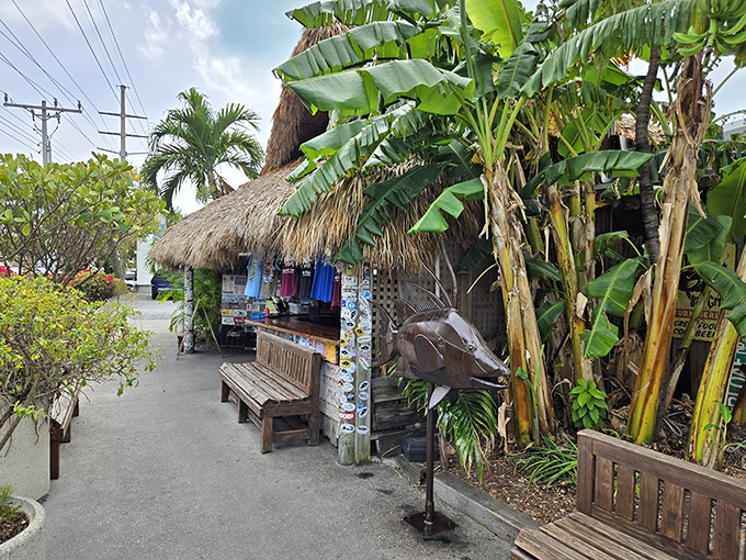 Palm fronds, thatched roofs, and wooden benches create the perfect tropical backdrop for pre-dinner conversations and post-meal relaxation.