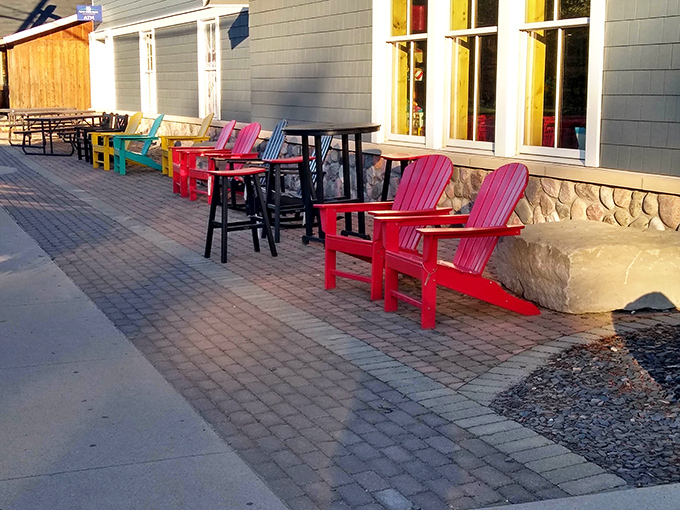 Colorful Adirondack chairs invite you to sit, savor, and watch the world go by—the perfect epilogue to your sandwich adventure.