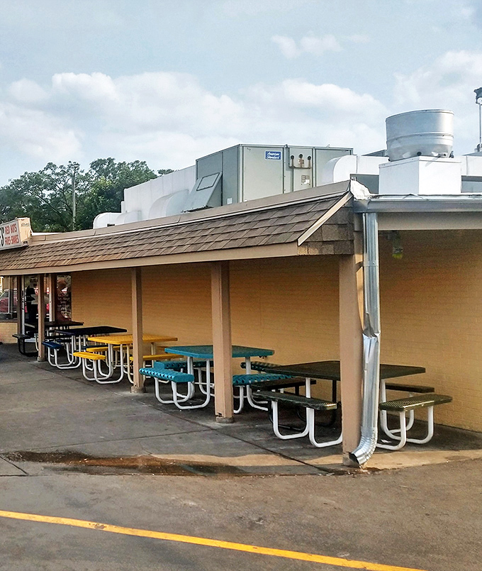 Outdoor seating at Johnnie's&mdash;where picnic tables become the great equalizer and everyone's united by the "lean forward" eating stance.