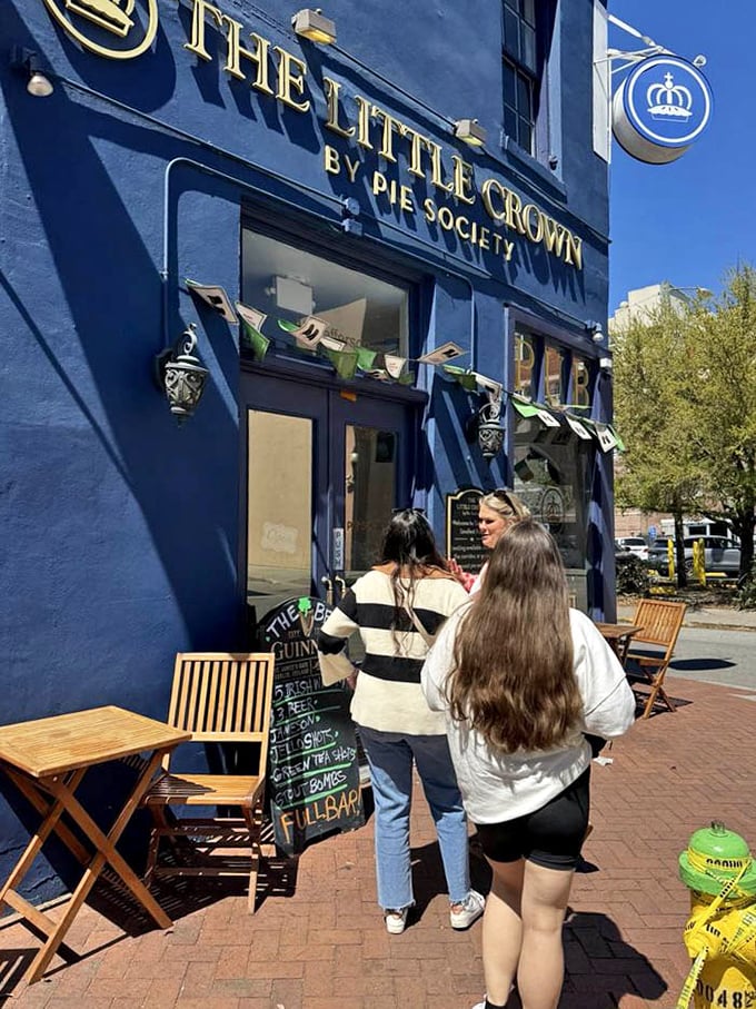 Outside, wooden chairs and tables offer the perfect perch for people-watching while savoring a pasty in Savannah's gentle sunshine.