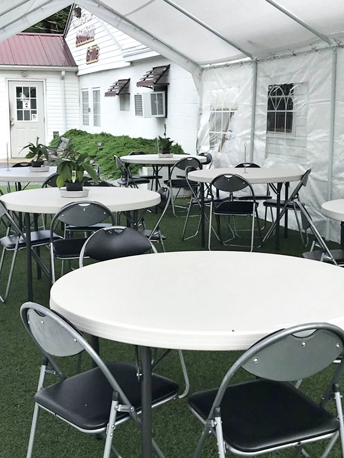 Outdoor seating under a tent offers a breath of fresh air with your meal&mdash;casual dining that feels like a backyard gathering with better food.