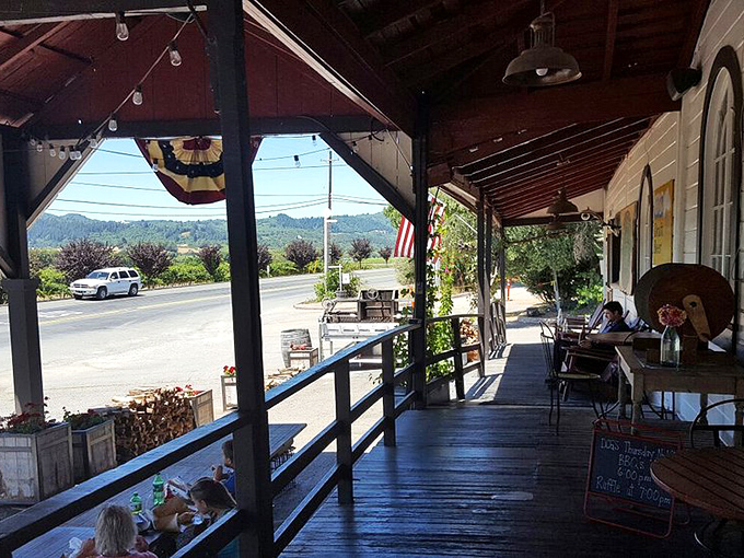 Outdoor dining with vineyard views &ndash; because your sandwich deserves a scenic backdrop too.