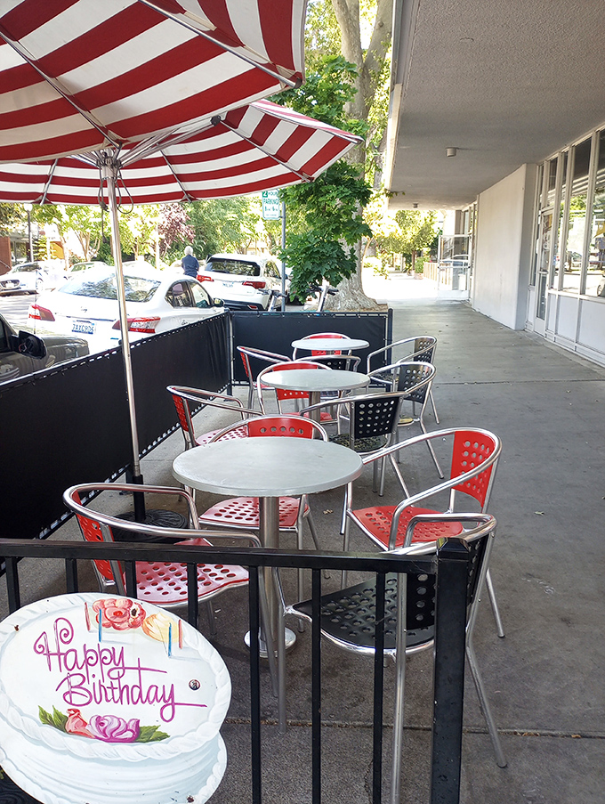 Outdoor seating where birthday wishes come true and calories don't count because you're technically eating in the fresh air.