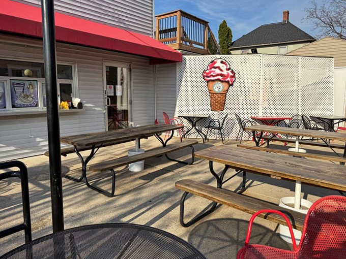 Outdoor seating with a giant ice cream cone watching over you&mdash;it's like dining under the benevolent gaze of a dairy deity.