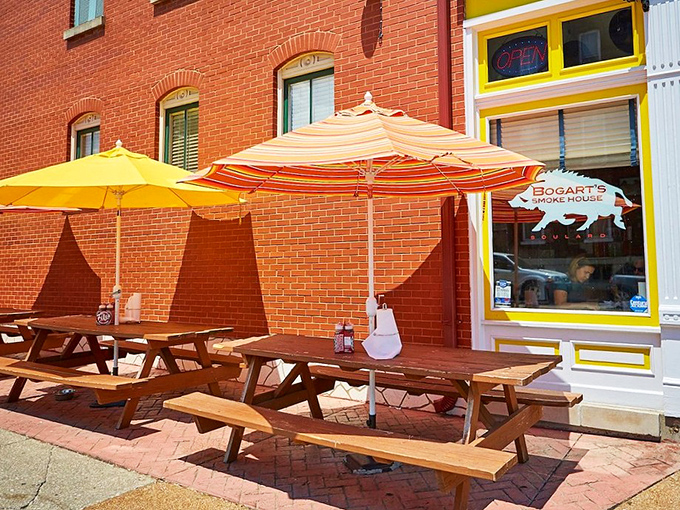 Picnic tables under bright umbrellas&mdash;because sometimes barbecue this good deserves to be enjoyed in the fresh air, where nobody can hear your happy groans.