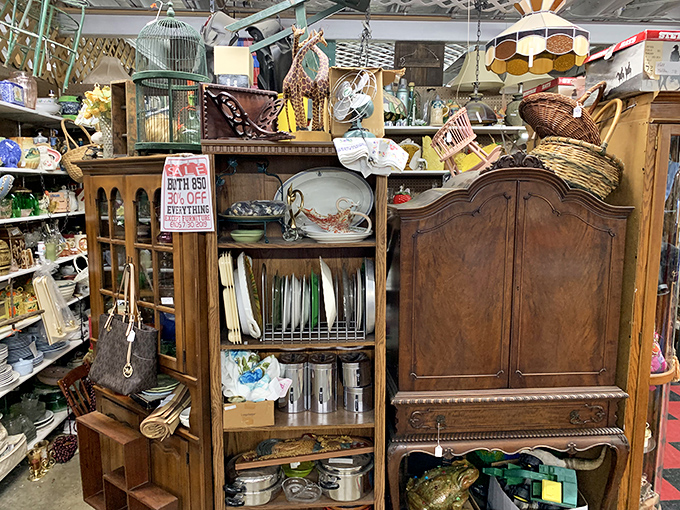 Cabinet Tetris: Professional level. Somehow they've managed to display everything from fine china to wicker baskets without a single casualty.
