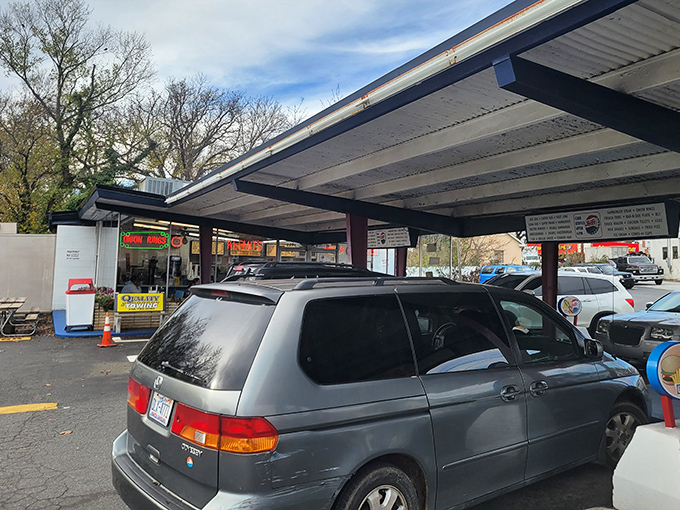 The drive-thru experience&mdash;where convenience meets tradition. Car windows down, the scent of grilled hot dogs wafting through the air, life is momentarily perfect. 