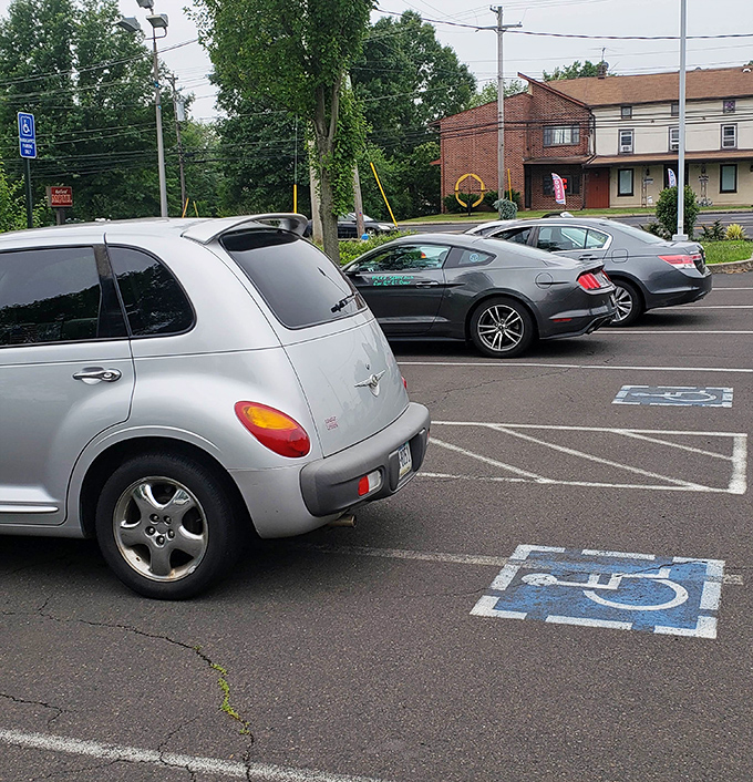 Even the parking lot tells a story – of locals who know exactly where to go when the sandwich siren calls.