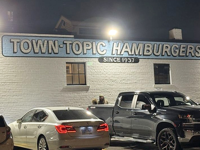 Even the parking lot tells a story &ndash; trucks and sedans side by side, united by the universal language of burger cravings.