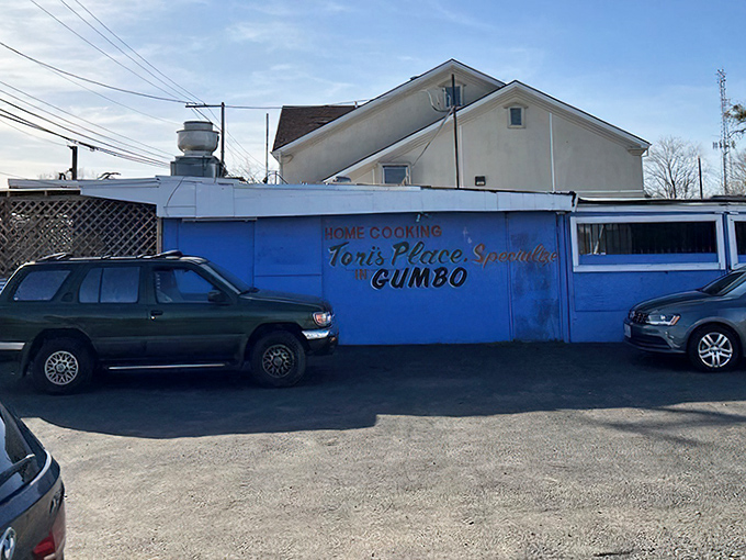 The side view reveals the restaurant's proud proclamation: "Specializes in GUMBO." When a place is confident enough to put their specialty right on the building, believe them.