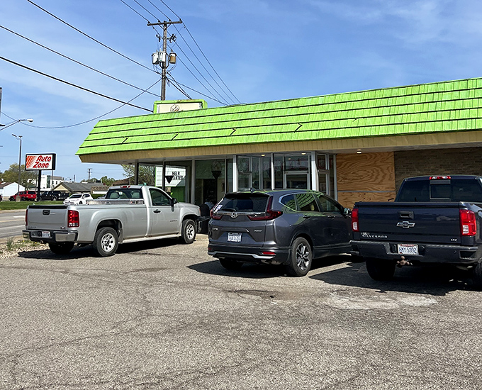 The parking lot&mdash;where vehicles of all makes and models find democracy in their shared mission: donut acquisition.