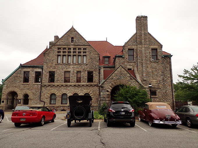 Even the parking lot hints at the treasures within &ndash; classic cars seem naturally drawn to timeless elegance.