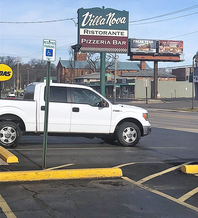 The sign stands tall above North High Street, a beacon guiding hungry Columbus residents to their pasta promised land since long before GPS.