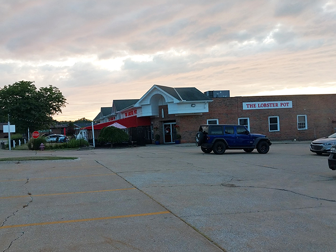 Even the parking lot at dusk hints at the coastal escape waiting inside—no passport or seasickness pills required.