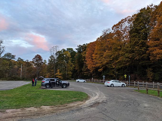 Autumn's grand welcome committee. This parking area's fiery foliage display is just the appetizer to the geological feast that awaits beyond.