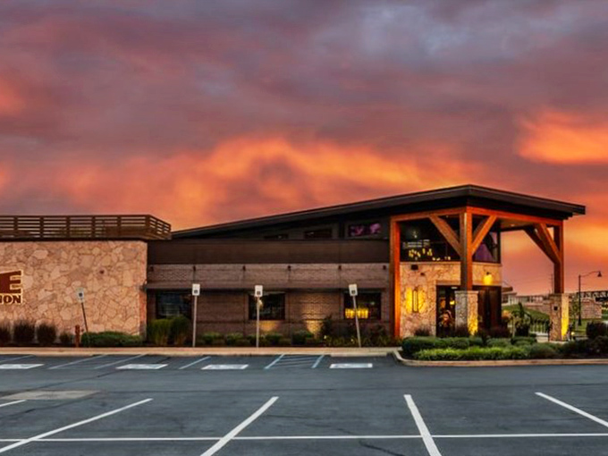 Even the parking lot at sunset looks like it should be on a postcard. The building practically glows with the promise of "yes, you made the right decision coming here."
