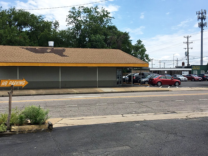 Even the parking sign glows that signature orange&mdash;a breadcrumb trail leading hungry pilgrims to biscuit salvation.