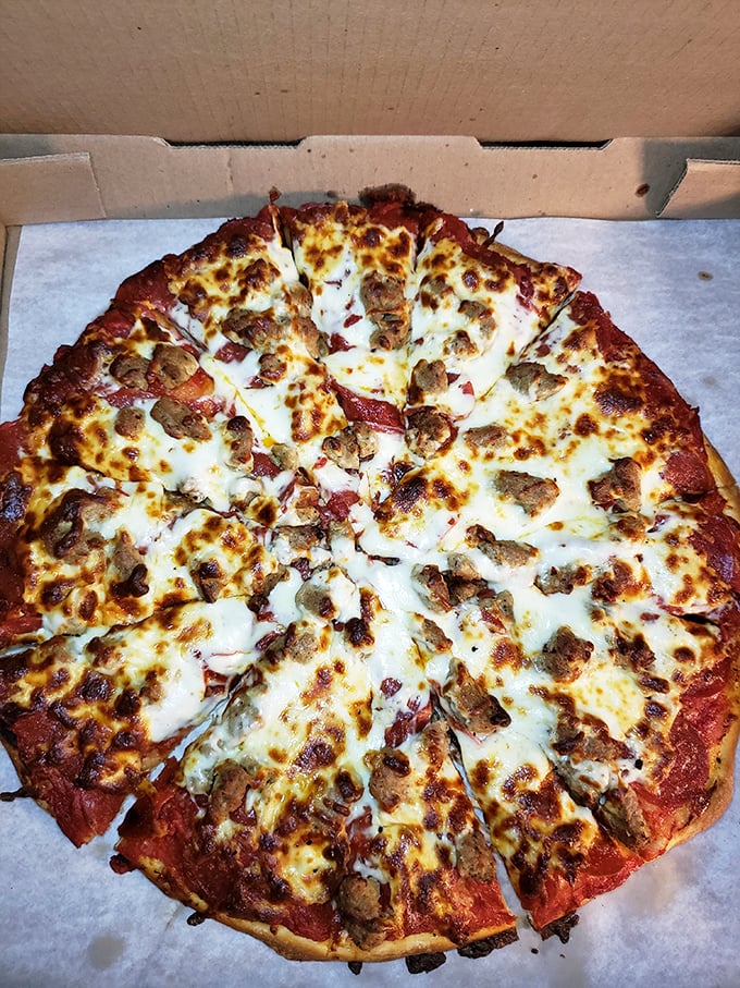 Pepperoni and sausage pizza that would make your Italian grandmother nod with quiet approval.