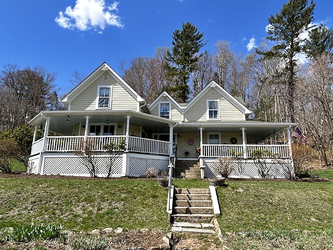 The Perry House B&B's wraparound porch practically demands you sit with coffee while judging the day's outfit choices of passing hikers.