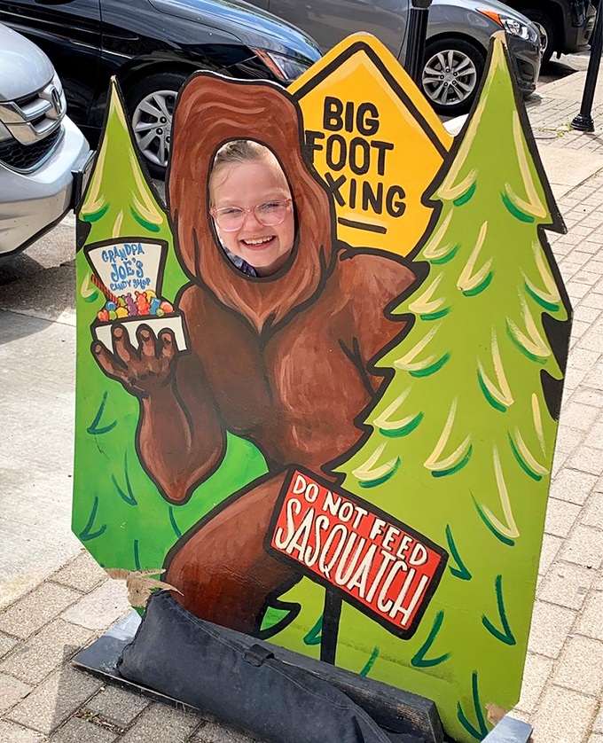 The Sasquatch photo op&mdash;because nothing says "I visited a candy shop" like pretending to be a cryptid with a sweet tooth.